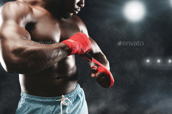 Close up of fighter on boxing ring wrapping fists Stock Photo by ...