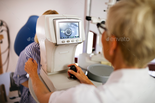 Ophthalmology eyesight diagnostic concept. Modern eye test machine ...