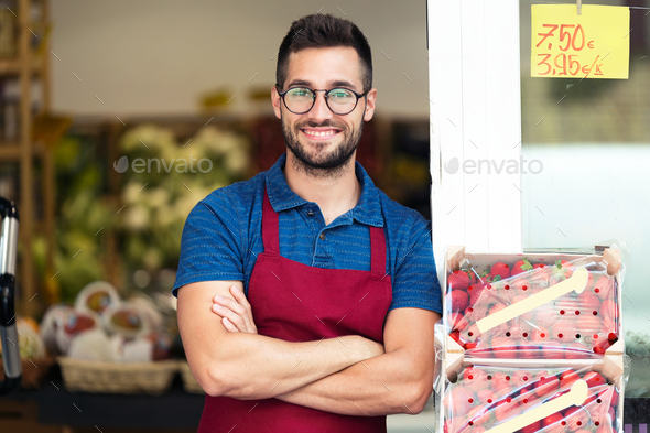 Portrait of handsome young salesman looking at camera in health Stock ...