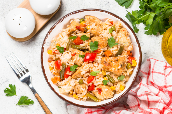 Rice with chicken and vegetables top view Stock Photo by Nadianb ...