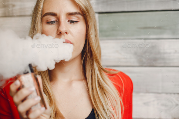 Stylish young girl in a city with vape Stock Photo by prostooleh ...