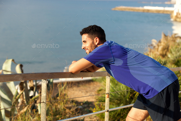 fit young man resting after run Stock Photo by mimagephotography ...