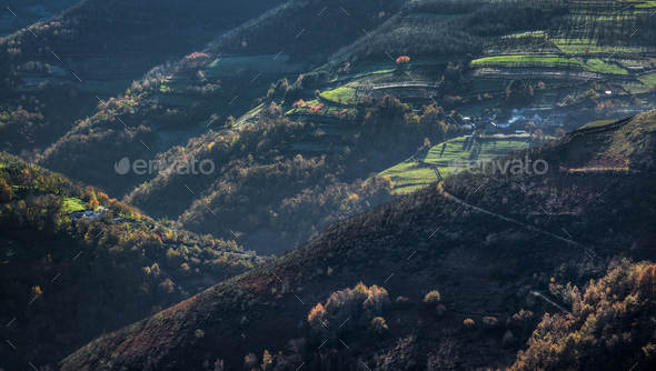Old rounded Mountains with Villages among Forests Stock Photo by ...