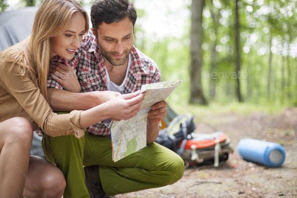 Finding right way on map Stock Photo by gpointstudio | PhotoDune