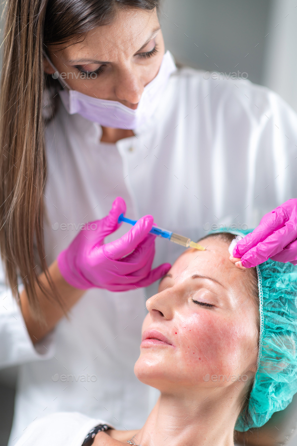 Hyaluronic Acid Injection Fillers for Forehead Stock Photo by microgen
