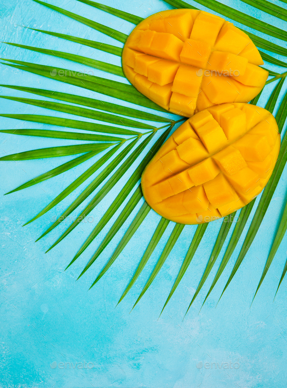 Fresh Mango on a Palm Leaf. Blue Background. Top View. Copy Space ...