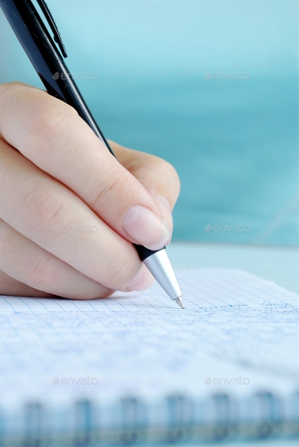 woman's hand and a pen Stock Photo by sergign | PhotoDune