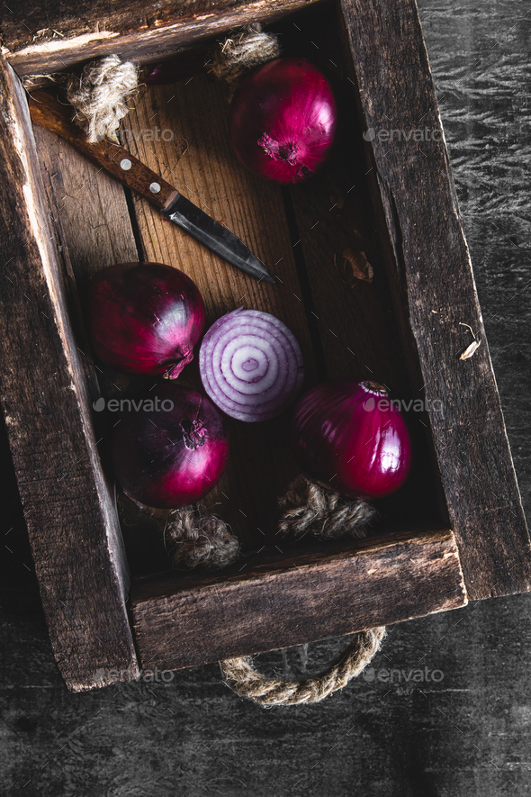detail of onion inside the box with dark background Stock Photo by ...