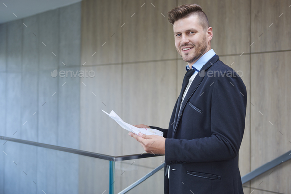 Man checking some important documents Stock Photo by gpointstudio ...