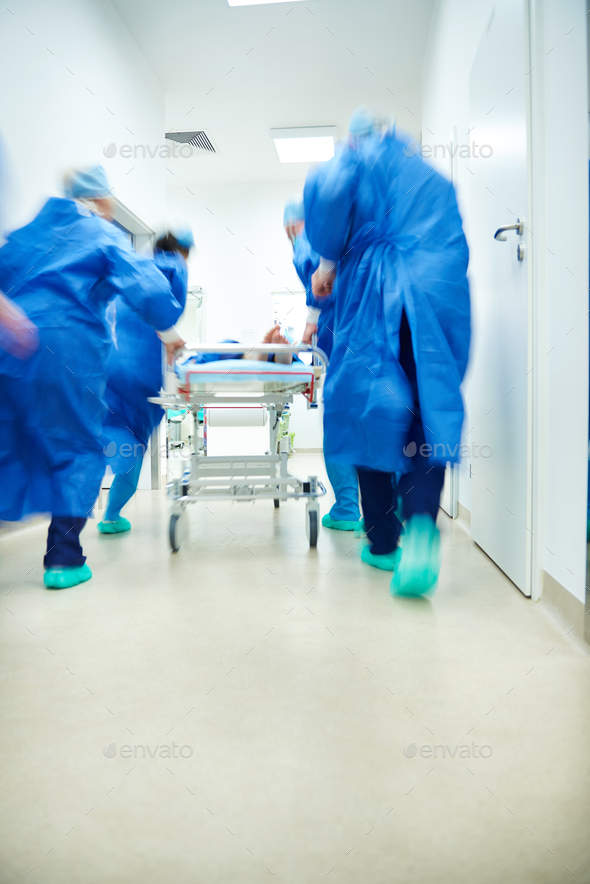 Team of doctors in a hurry Stock Photo by gpointstudio | PhotoDune