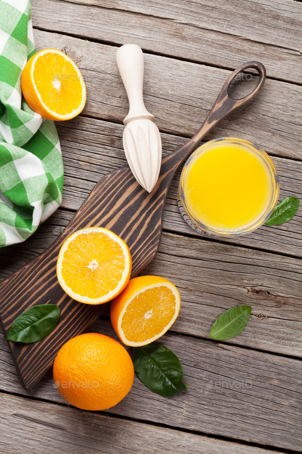 Fresh ripe oranges and juice Stock Photo by karandaev | PhotoDune