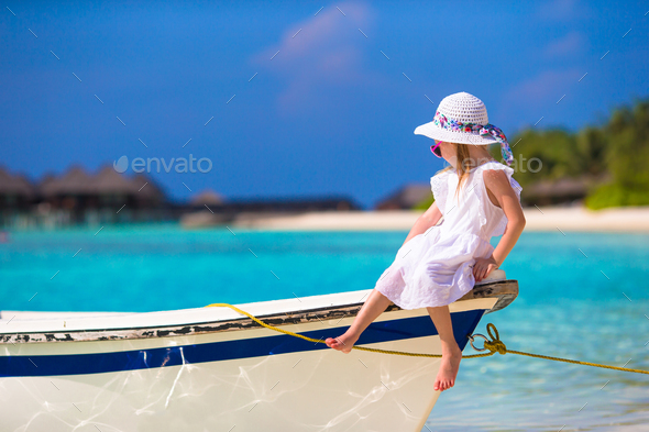 Adorable happy smiling little girl on boat in the sea Stock Photo by ...