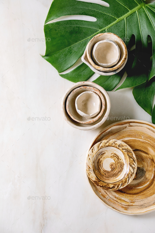 Empty ceramic dishes Stock Photo by NatashaBreen | PhotoDune