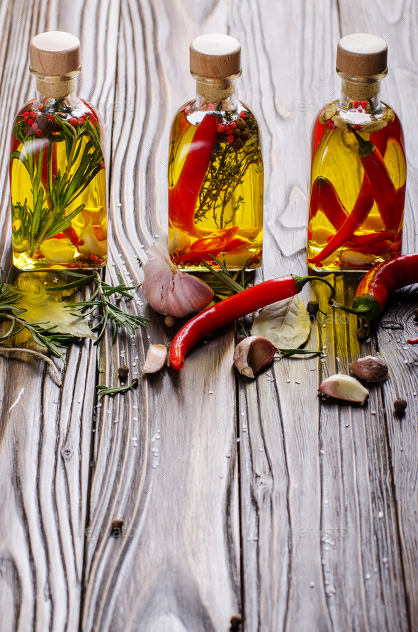Food background made of oils condiments and spices on kitchen table ...