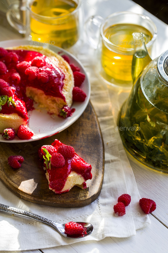 Cheesecake with raspberry sauce Stock Photo by karaidel | PhotoDune