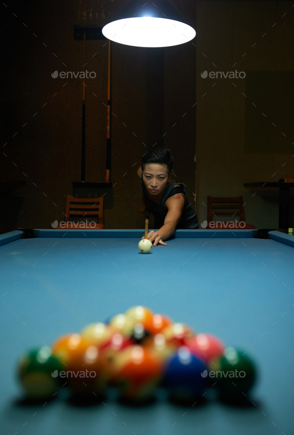 Playing billiard Stock Photo by DragonImages | PhotoDune