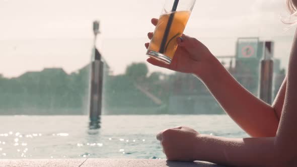 Sipping Cocktail on Holiday Near Pool, Stock Footage | VideoHive