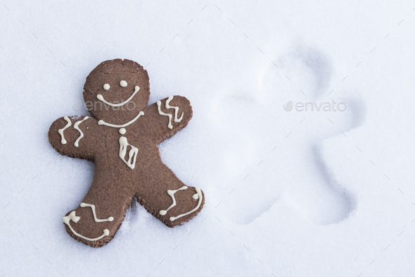 Gingerbread Man in the Snow Stock Photo by simonida | PhotoDune