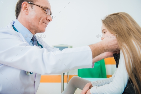 Medical Doctor Examination Stock Photo by duallogic | PhotoDune