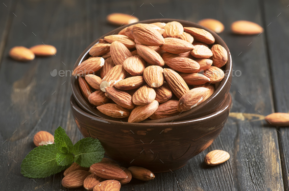 Fresh almond in bowl Stock Photo by Olga_Kochina | PhotoDune