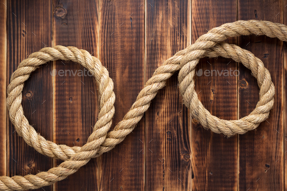 ship rope at wooden background Stock Photo by seregam | PhotoDune