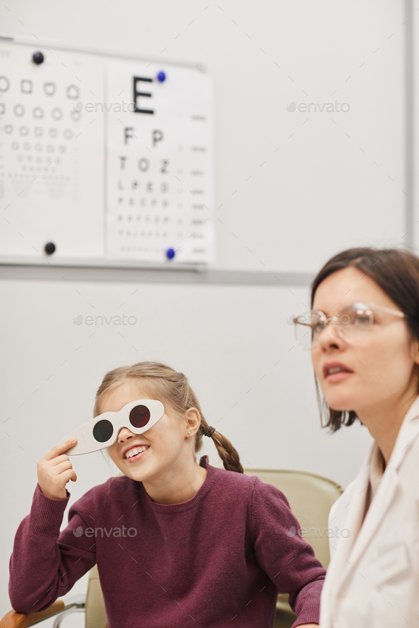 Cute Girl at Eye Exam in Ophthalmology Clinic Stock Photo by ...