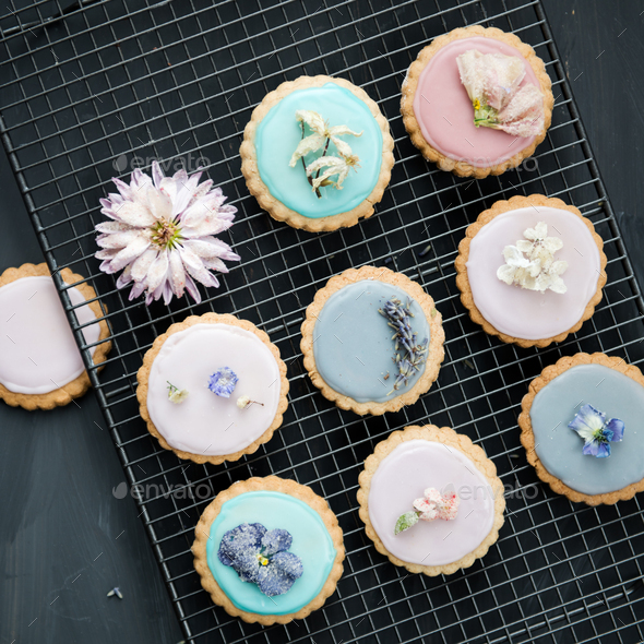 Homemade Biscuits covered with Pastel Color Icing Stock Photo by Manuta