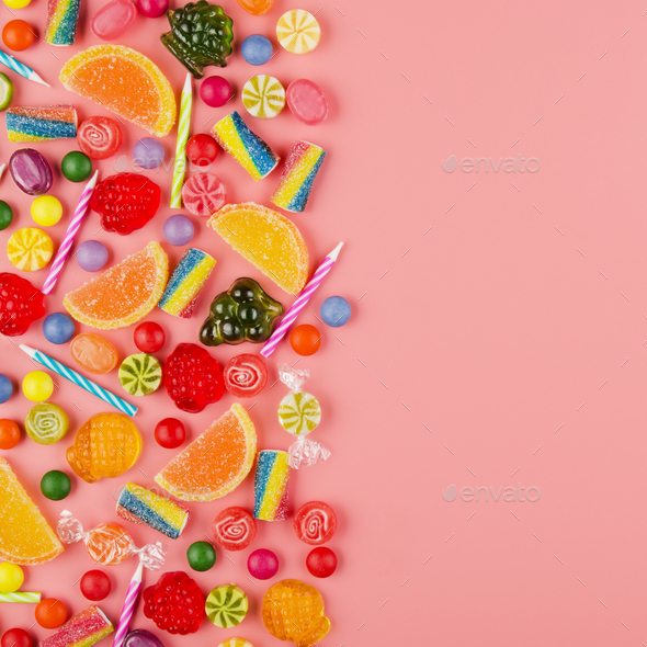 Flat lay view at sweet background of different type color and taste ...