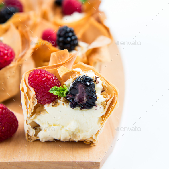 Homemade Filo Pastry Baskets with Mascarpone Cream and Berries Stock ...