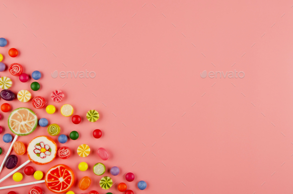 Flat lay view at sweet background of different type color and taste ...