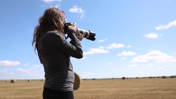 Female Photographer Framing Up the Shot, Stock Footage | VideoHive