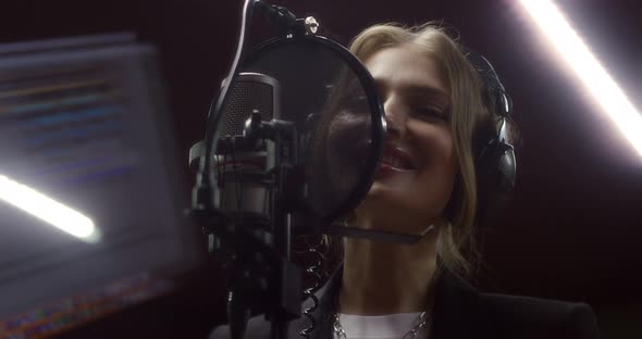 Beautiful Woman Sings a Love Song in Recording Studio, Stock Footage