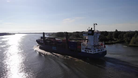 NCL Alesund Cargo Container Ship Travelling By The River With Loaded ...