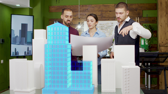 Team of Architects Working on City Skyscrapers Using Augmented Reality ...