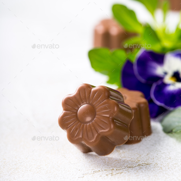 Chocolate candies in flower shape Stock Photo by Merinka | PhotoDune
