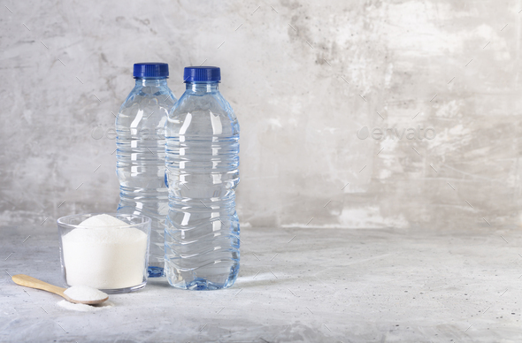 Collagen protein powder and two bottles of water - Hydrolyzed Stock ...