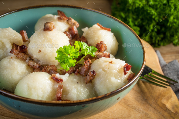 Meat stuffed potato dumplings. Stock Photo by foto_pstryki | PhotoDune