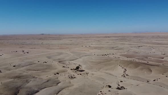 Huge desert with amazing grey sand, stunning landscape view, blue sky ...