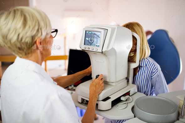 Ophthalmology eyesight diagnostic concept. Modern eye test machine ...