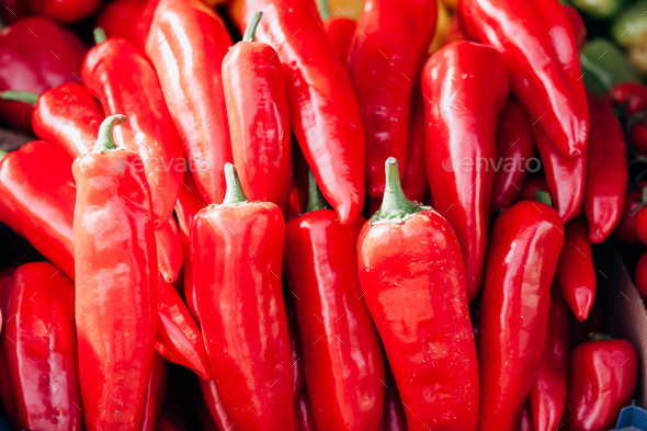 Heap Of Ripe Big Red Peppers as background. Background and red pepper ...