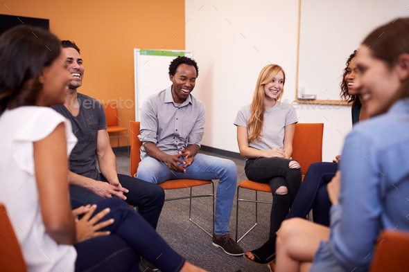 Multi-Cultural Group Of Men And Women At Mental Health Group Therapy ...