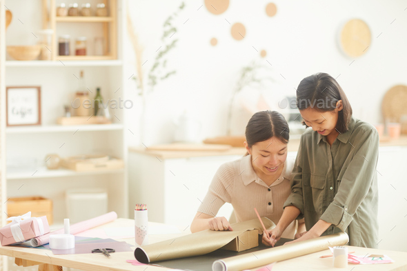 Measuring Piece Of Wrapping Paper Stock Photo by AnnaStills | PhotoDune
