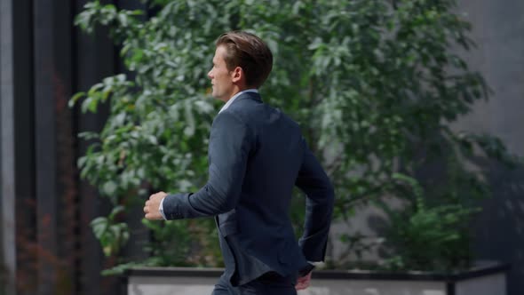 Serious Finance Worker Running Fast for Work Meeting in Modern Gray ...