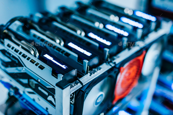 Bitcoin and crypto mining farm. Big data center. Stock Photo by photocreo