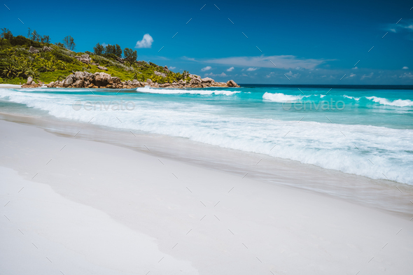 Vacation holiday. Rolling ocean waves, pristine blue color lagoon and ...