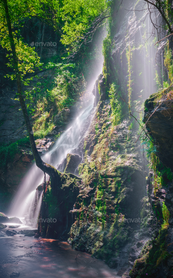 Beautiful Glowing Waterfall Veil illuminated by the Sun Stock Photo by ...