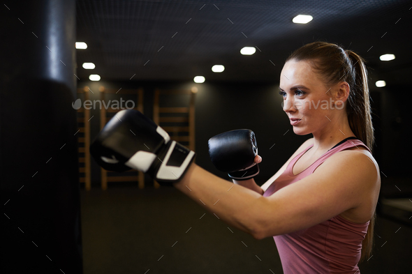 Side View Young Woman Boxing Stock Photo by seventyfourimages | PhotoDune
