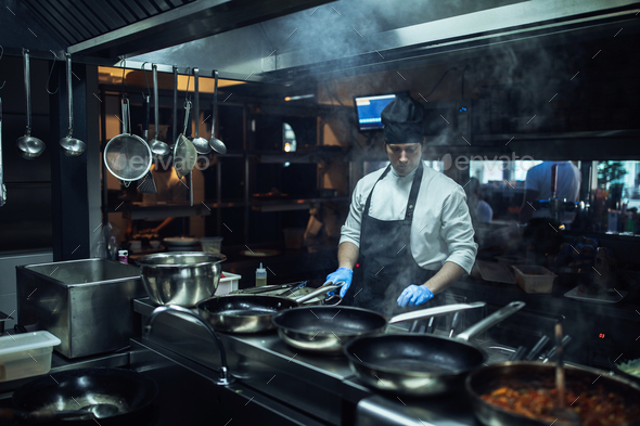Multitasking in the kitchen Stock Photo by bernardbodo | PhotoDune