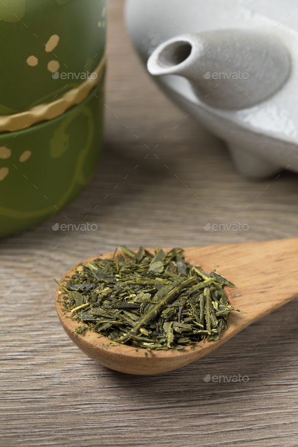 Wooden spoon with Japanese green tea Stock Photo by picturepartners