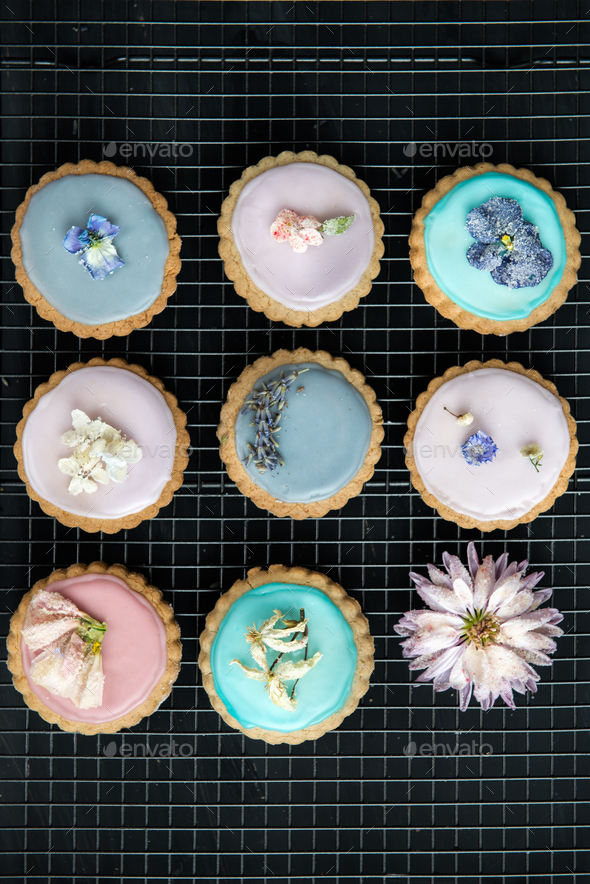 Homemade Biscuits covered with Pastel Color Icing Stock Photo by Manuta